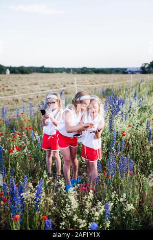 Girl using cell phones Stock Photo - Alamy