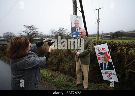 Ulster Unionist party leader Steve Aiken and his wife Bev arrives to ...