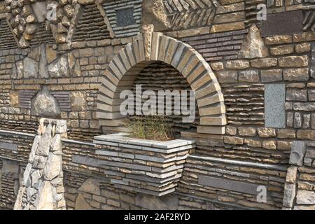 Fake window in a brick and stone wall, for backgrounds, texture. Street ...