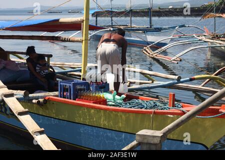 Ice blocks being transported for use of the artisanal Filipino tuna ...