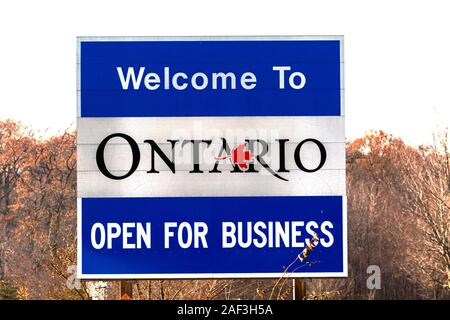 "Welcome To Ontario, Open for Business" sign seen as transport truck ...