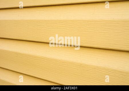 Soft yellow siding, texture and horizontal plastic background. 2019 ...