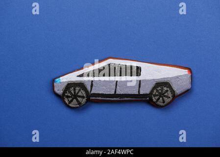 The hand-made eatable gingerbread Tesla Cybertruck electric car on ...