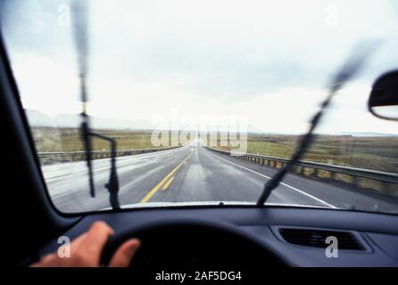 A first person perspective of driving in an automobile next to a Stock ...