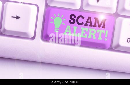 Writing note showing Scam Alert. Business concept for Safety warning to ...