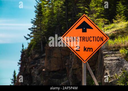 Temporary condition road warning signs on roadside before road work ...