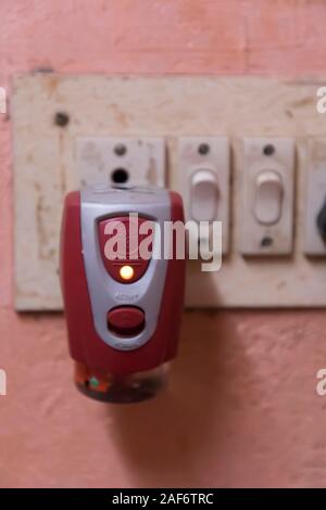 Mosquito killer. Electric raptor fumigator at outlet Stock Photo - Alamy