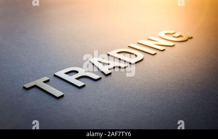 Word trading written with white solid letters on a board. Word trading ...