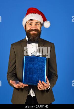 Businessman with happy face holds present box in close up Stock Photo ...