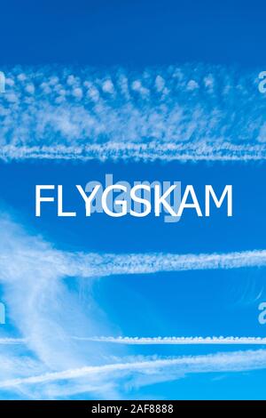 Climate change and Flygskam concept image with blue sky and vapour ...