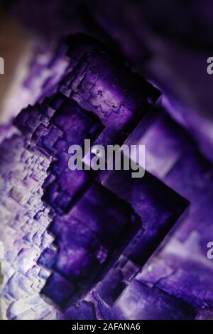 Light purple geometric fluorite crystal geode cluster catching the ...