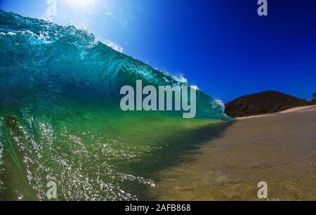 ocean wave falling down under sunset in lombok Stock Photo - Alamy