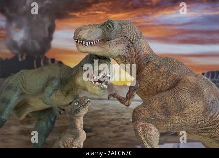 Family of Tyrannosaurus rex dinosaurs with erupting volcano in the ...