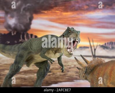 Tyrannosaurus rex fighting with a triceratops with erupting volcano in ...