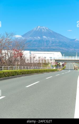 Vertical shot of a road on mountain background Stock Photo - Alamy