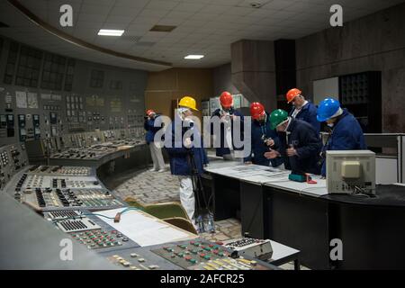 Tourists visiting the control room of Chernobyl’s reactor four, the ...