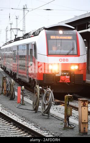 Cityjet train of Austrian Federal Railways on the rail tracks on sunny ...