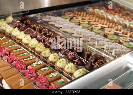 Various sweet items in window display in bakery or supermarket Stock ...
