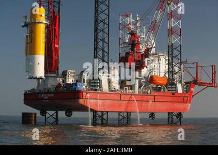 Jack-up construction vessel SEA JACK installing monopile foundations ...