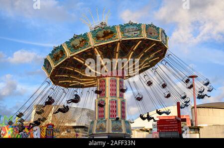 Paris carousel - Chair swing ride in amusement park at Tuileries garden ...