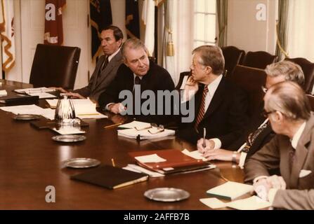 Jimmy Carter meets with members of his cabinet and staff at Camp David ...