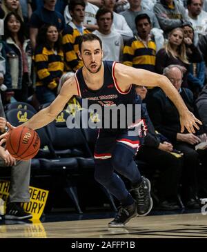 Saint Mary's Tommy Kuhse (12) passes around Utah State's Ben Fakira (21 ...