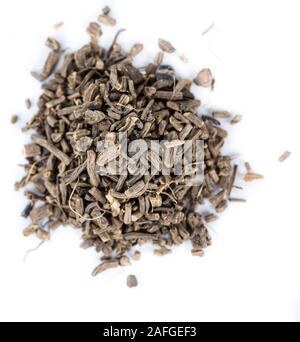 Dried Valerian root isolated on white background. Valeriana officinalis ...