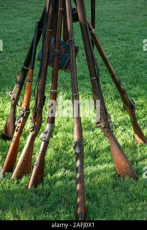 Stacked rifles at an American Civil War reenactment Stock Photo - Alamy