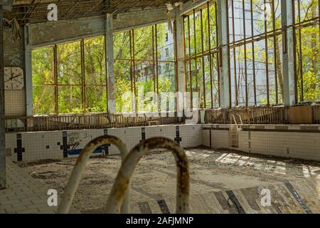 Chernobyl zone. Swimming pool in the city of Pripyat in Ukraine ...