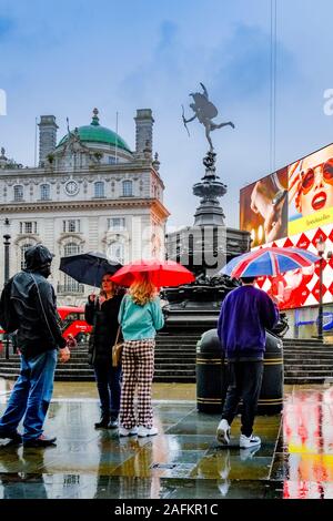 Rainy wet day, Piccadilly Circus, London, England, UK Stock Photo - Alamy
