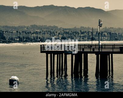 A pier off of Sterns Wharf juts into the Santa Barbara Harbor with a ...