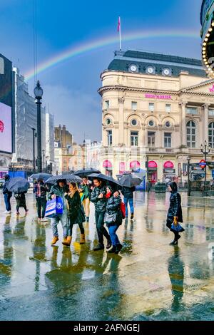 Rainy wet day, rainbow, Piccadilly Circus, London, England, UK Stock ...