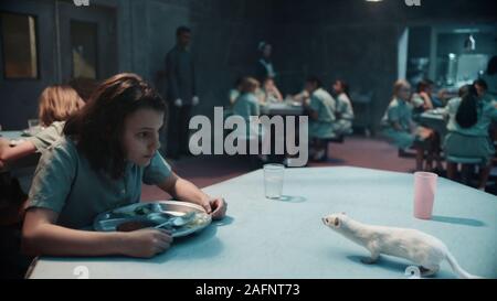 London.UK. Dafne Keen and Pantalaimon (voiced by Kit Connor) in a scene ...