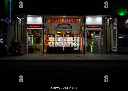 Amusement arcade at sunset at the seaside Stock Photo - Alamy