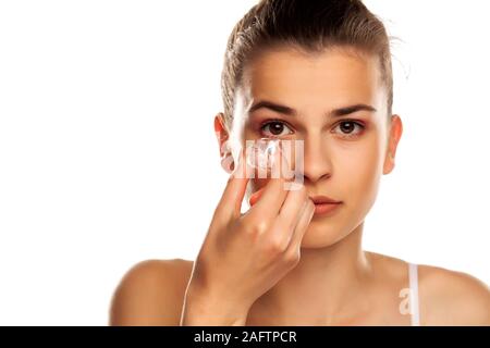 woman with ice cubes on eyes Stock Photo - Alamy