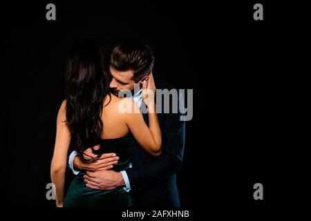 Back rear spine photo of two school kids jumping with new backpacks for ...