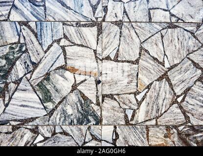 Decorative slate stone paving of path RHS Gardens Royal Horticultural Society garden Rosemoor ...