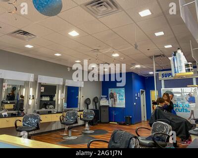 Orlando,FL/USA-12/13/19: A Supercuts hair salon interior with it's hair ...