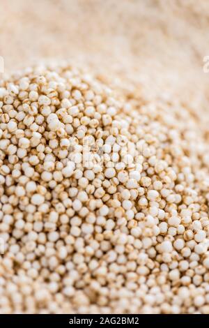 Heap of healthy puffed quinoa close up as an ingredient for breakfast ...
