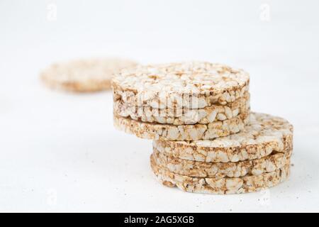 Closeup shot of a stack of pignolia isolated on a white background ...
