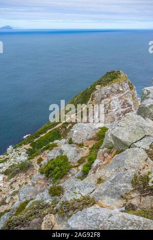 Beautiful shot of the Cape Peninsula shore in South Africa with Cape Point in the background ...