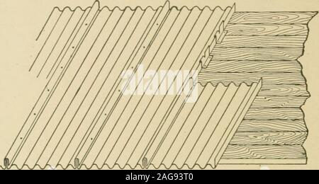 A corrugated metal building with a metal chimney up the side Stock ...