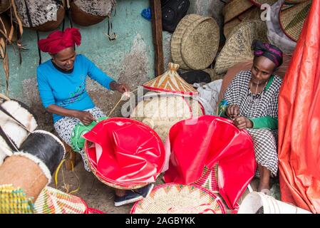 Two Traditional Ethiopian Women Hand Weaving Traditional Baskets in the ...