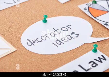paper cards with diagram and decorator ideas inscription pinned on cork ...