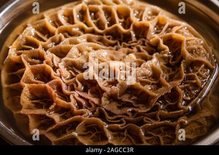 Fresh cow stomach in a bowl of water. Chopped beef stomach before ...