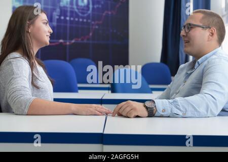 Campus life, students Love. Couple of students with a books. Education ...
