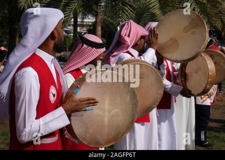 Bahraini musicians playing traditional music on tars (drums) on the ...