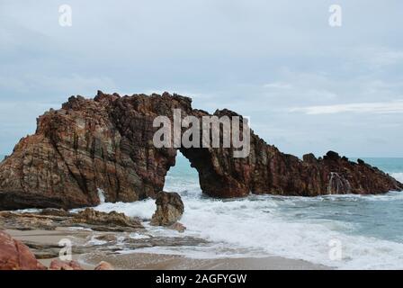 Iconic rock formation, Pedra Furada, Jericoacora, Brazil Stock Photo ...