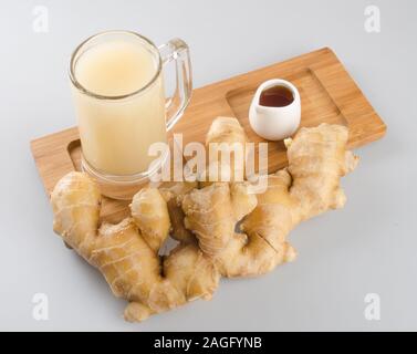 Ginger tea or Ginger tea with haney on background Stock Photo - Alamy