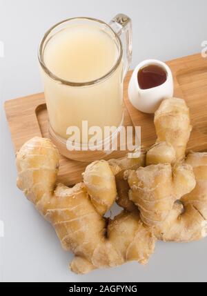 Ginger tea or Ginger tea with haney on background Stock Photo - Alamy